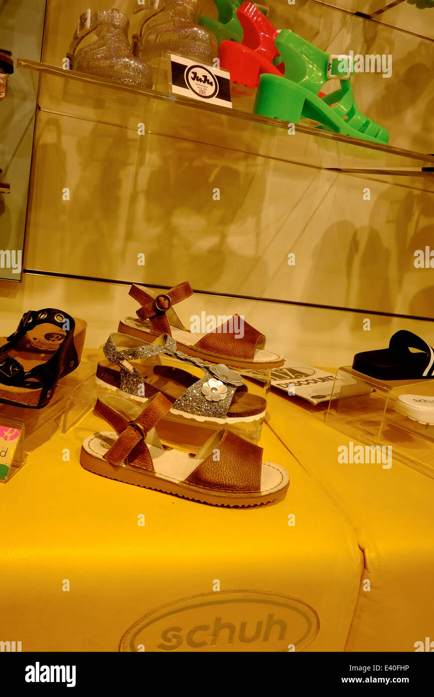 Inside a branch of Schuh showing typical footwear display England UK ...