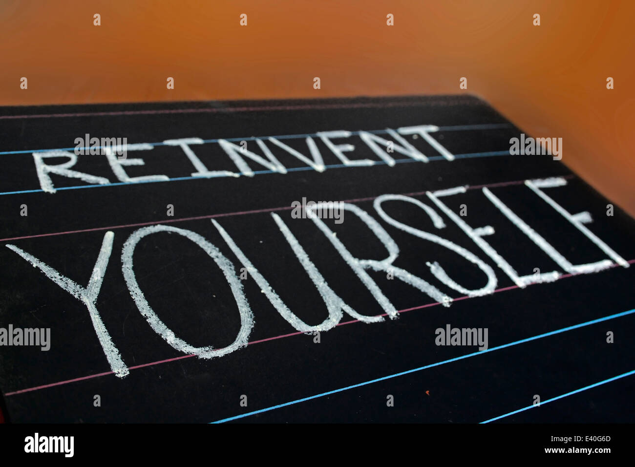 reinvent yourself phrase handwritten on black chalkboard Stock Photo ...