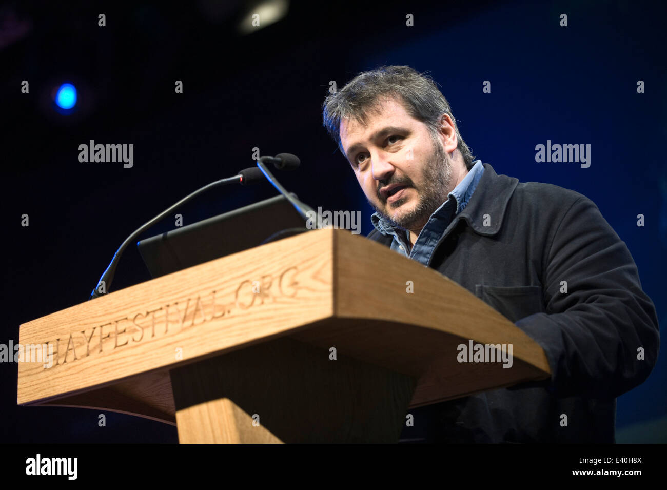 Festival Director Peter Florence speaking from lectern on stage at Hay ...