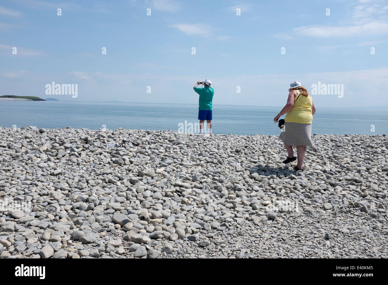 Tourists on the Pebble Beach in Porthkerry Park Barry South Wales Stock ...