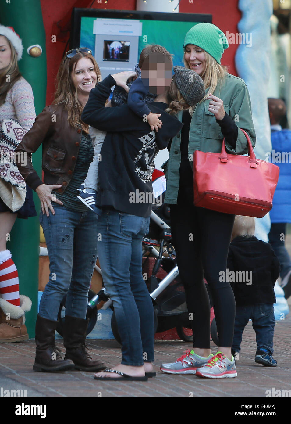 Fitness guru Jillian Michaels and her partner Heidi Rhoades visit Santa ...