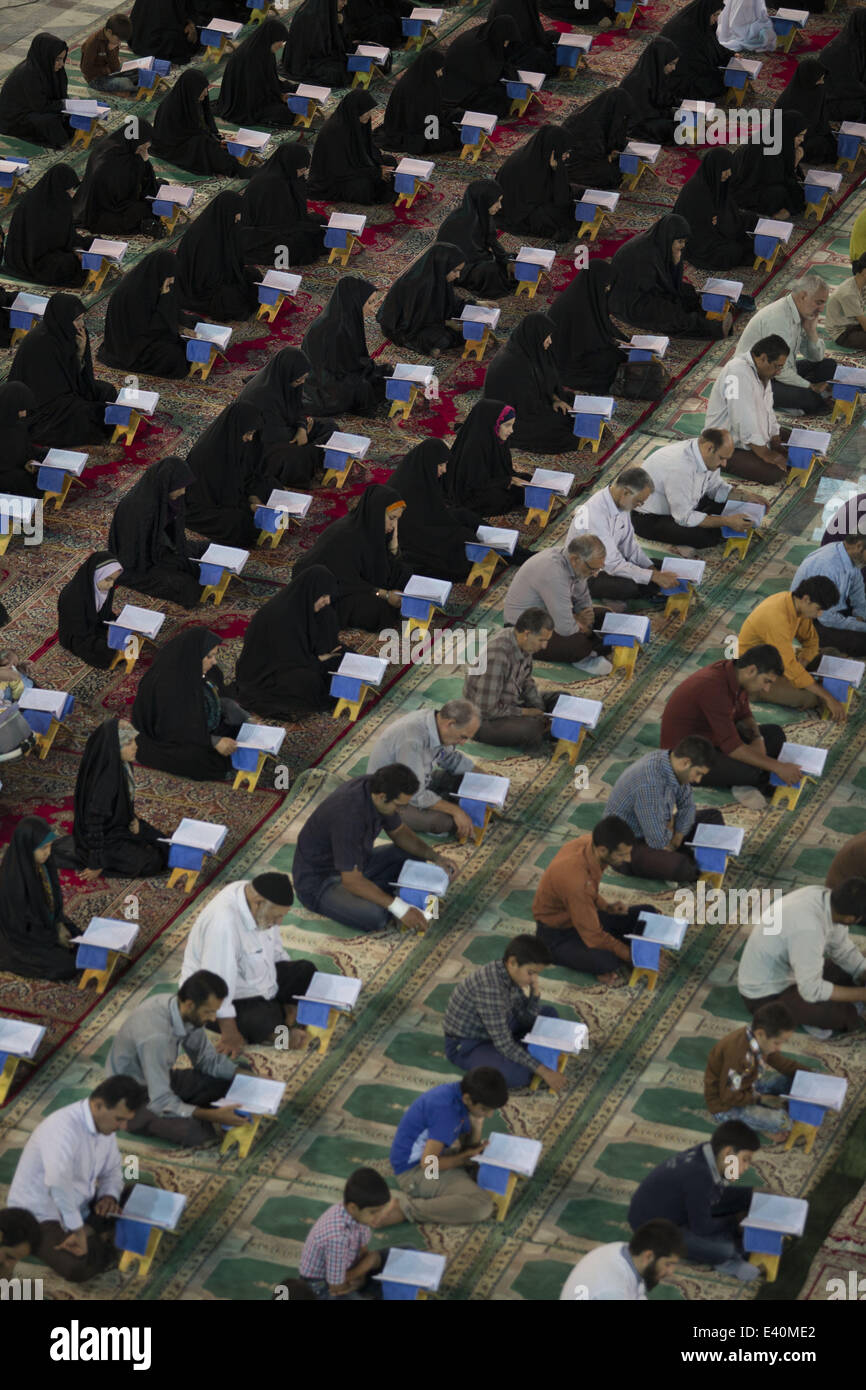 Aran And Bidgol, Iran. 2nd July, 2014. Iranian men and women recite ...