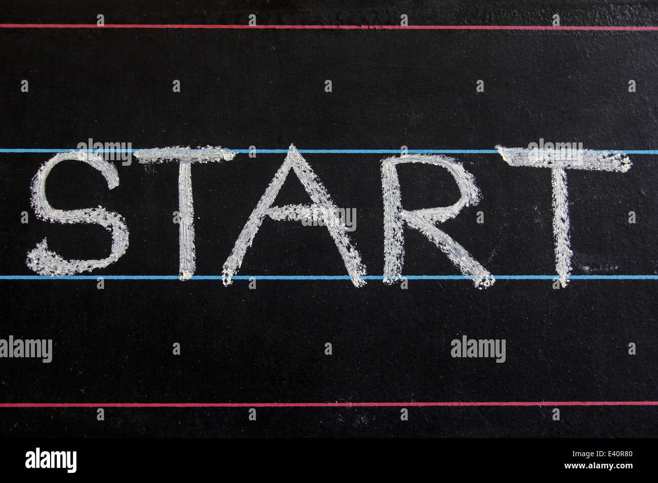 Start word handwritten on black chalkboard Stock Photo - Alamy