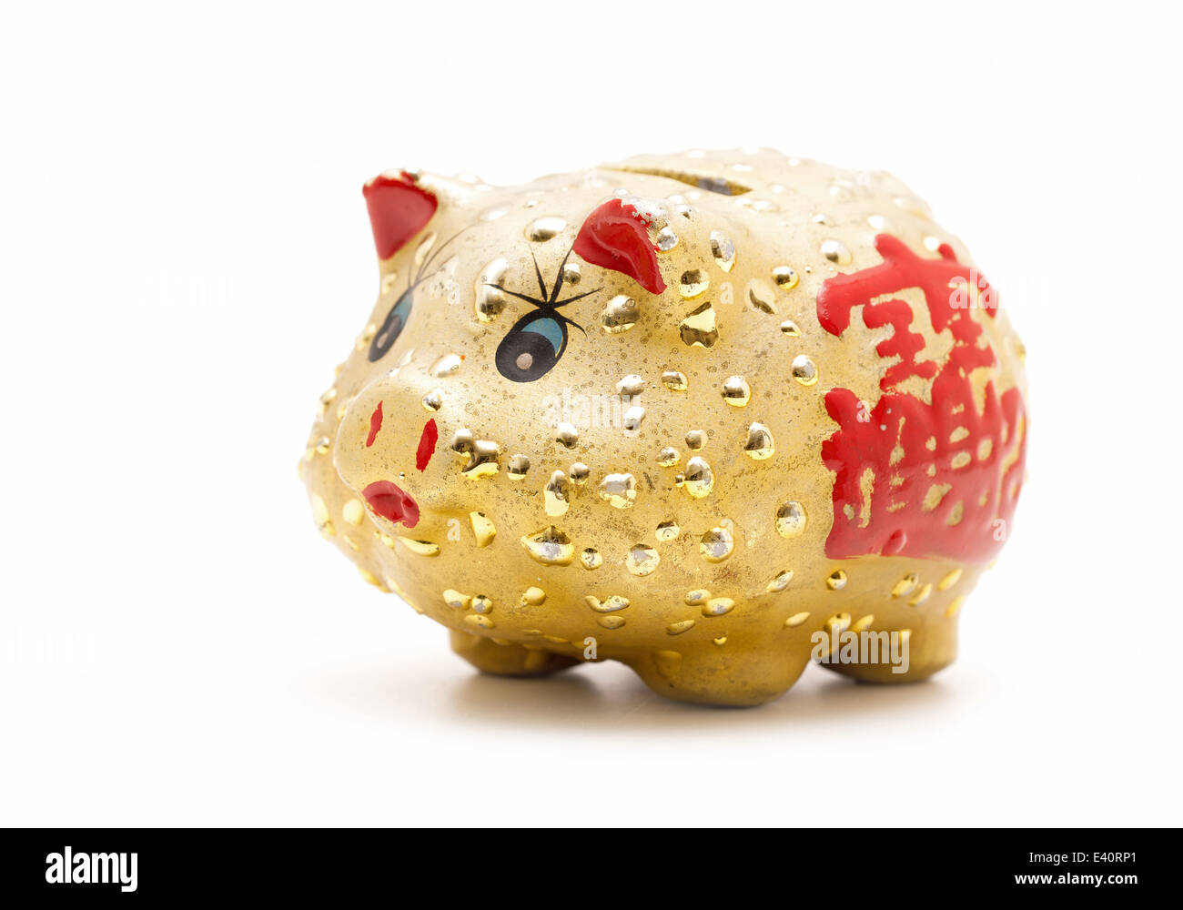 Gold piggy bank isolated Stock Photo - Alamy