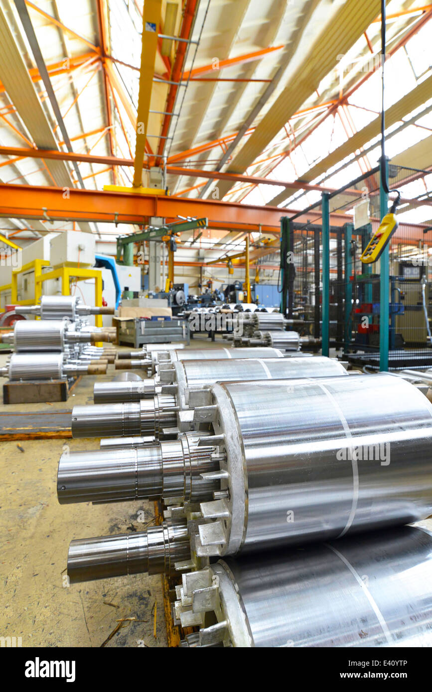 Electric motor production in a factory, shafts to be installed Stock ...