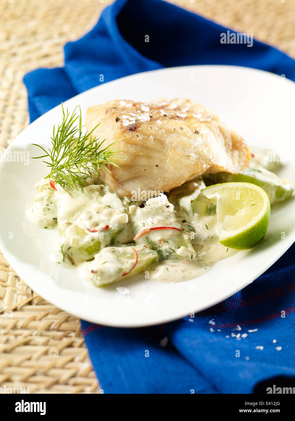 Coalfish fillet with dill gherkins Stock Photo - Alamy