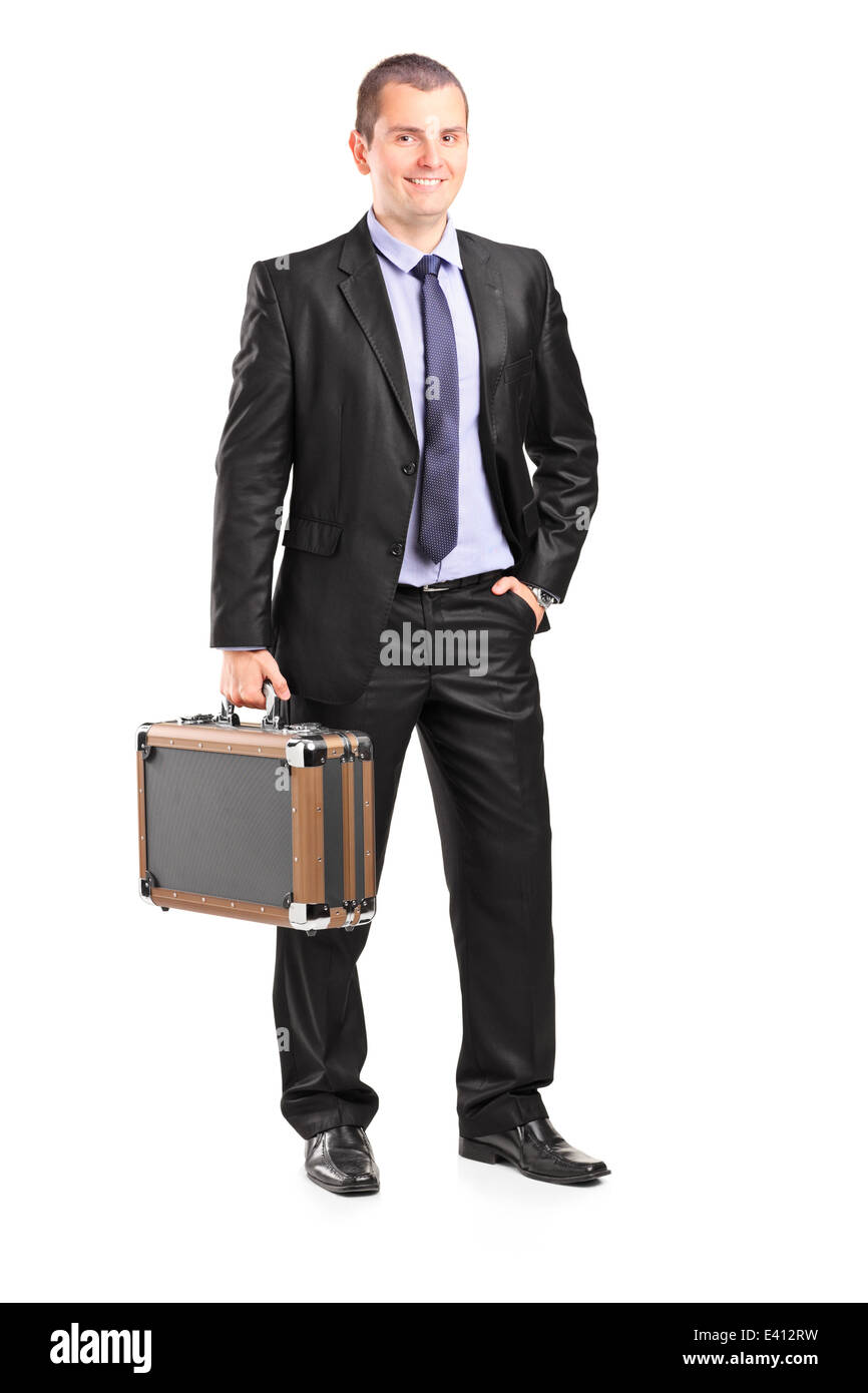 Full length portrait of a handsome businessman holding a briefcase ...