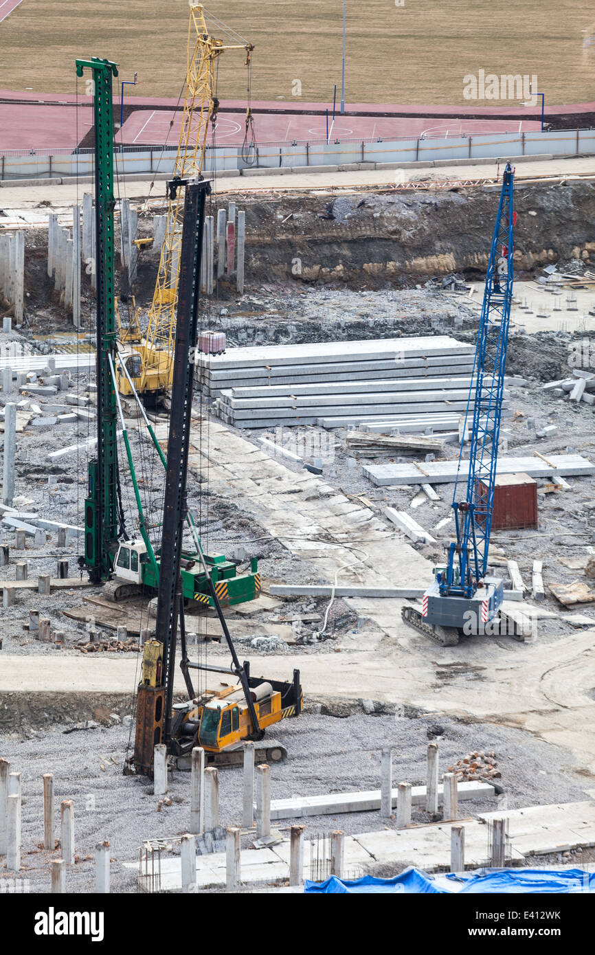 Construction site with machinery for piling into the ground Stock Photo ...
