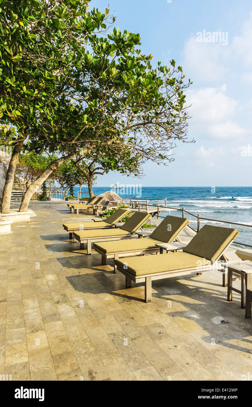 Indonesia, Riau Islands, Bintan, Nikoi Island, Sun loungers at hotel ...