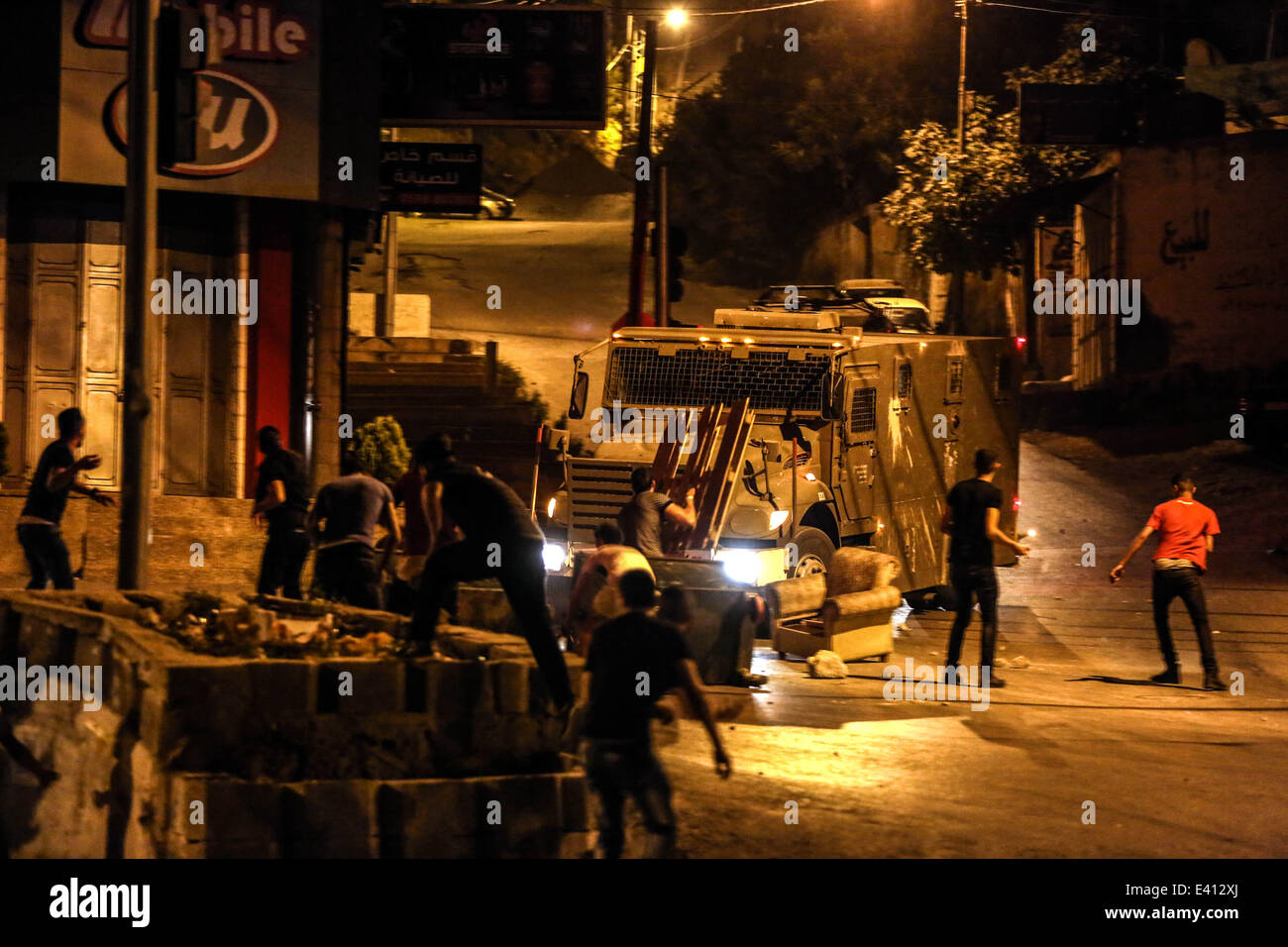 Nablus City, West Bank. 2nd July, 2014. Palestinian protesters threw ...