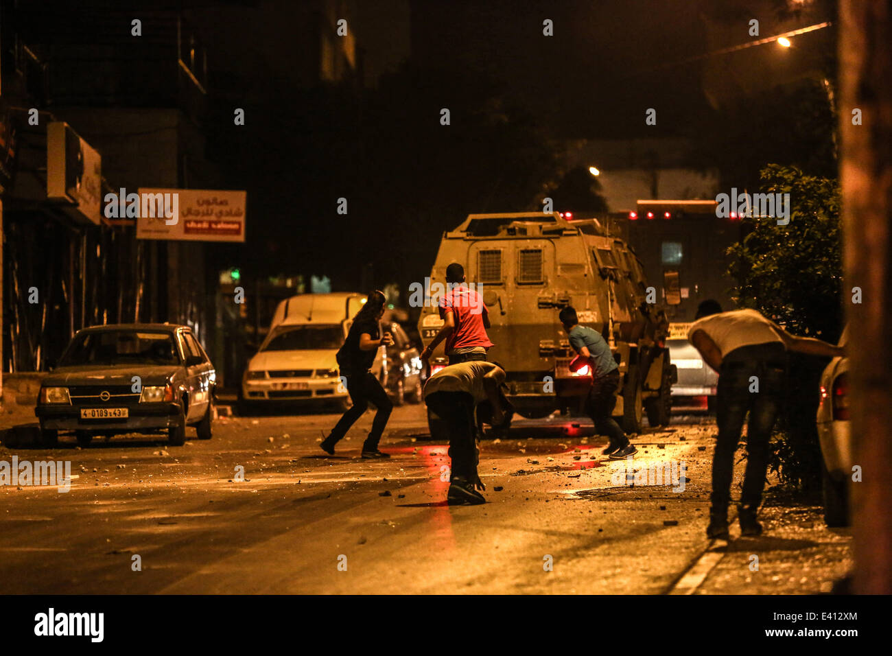 Nablus City, West Bank. 2nd July, 2014. Palestinian protesters threw ...
