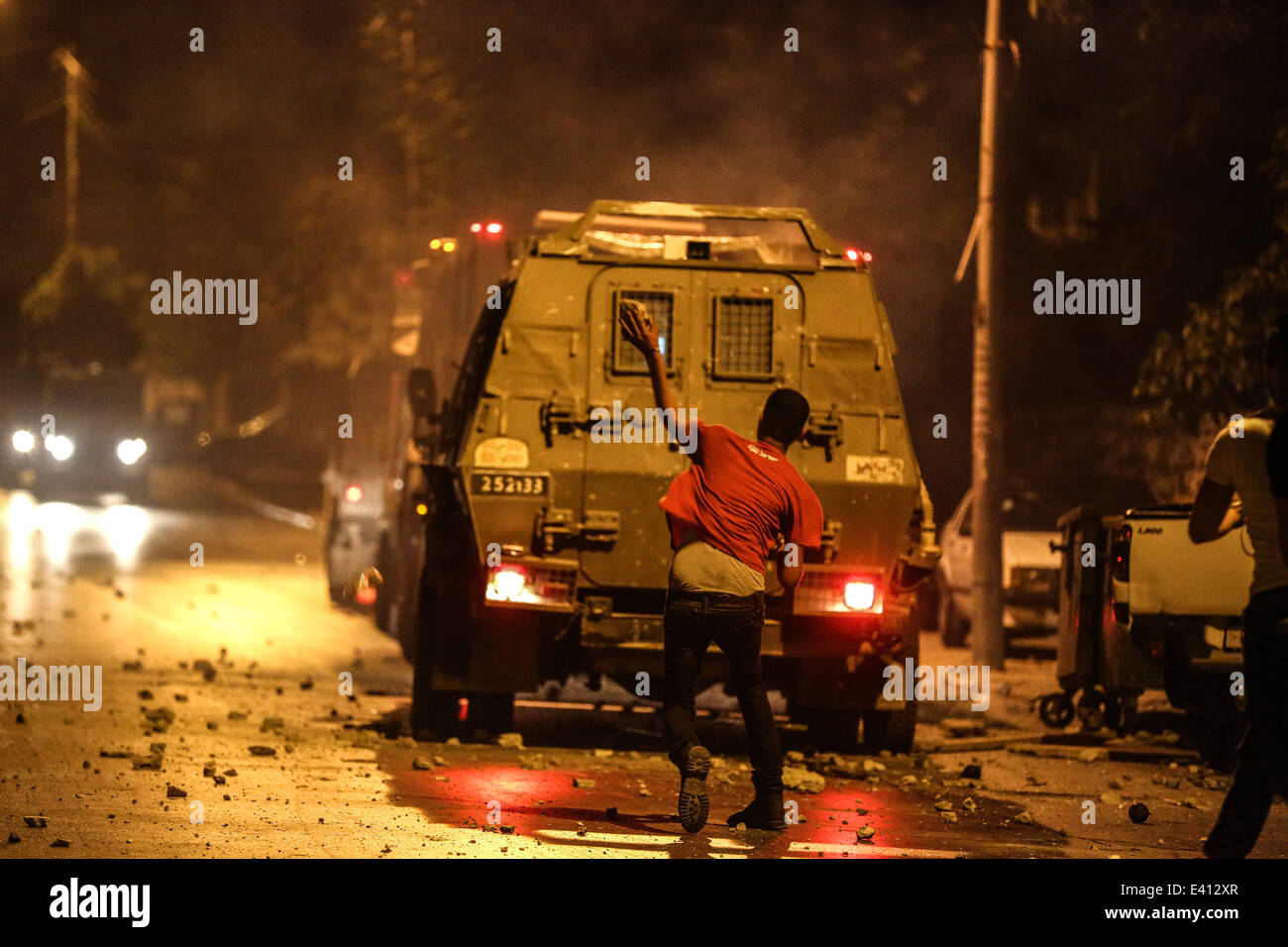 Nablus City, West Bank. 2nd July, 2014. Palestinian protesters threw ...