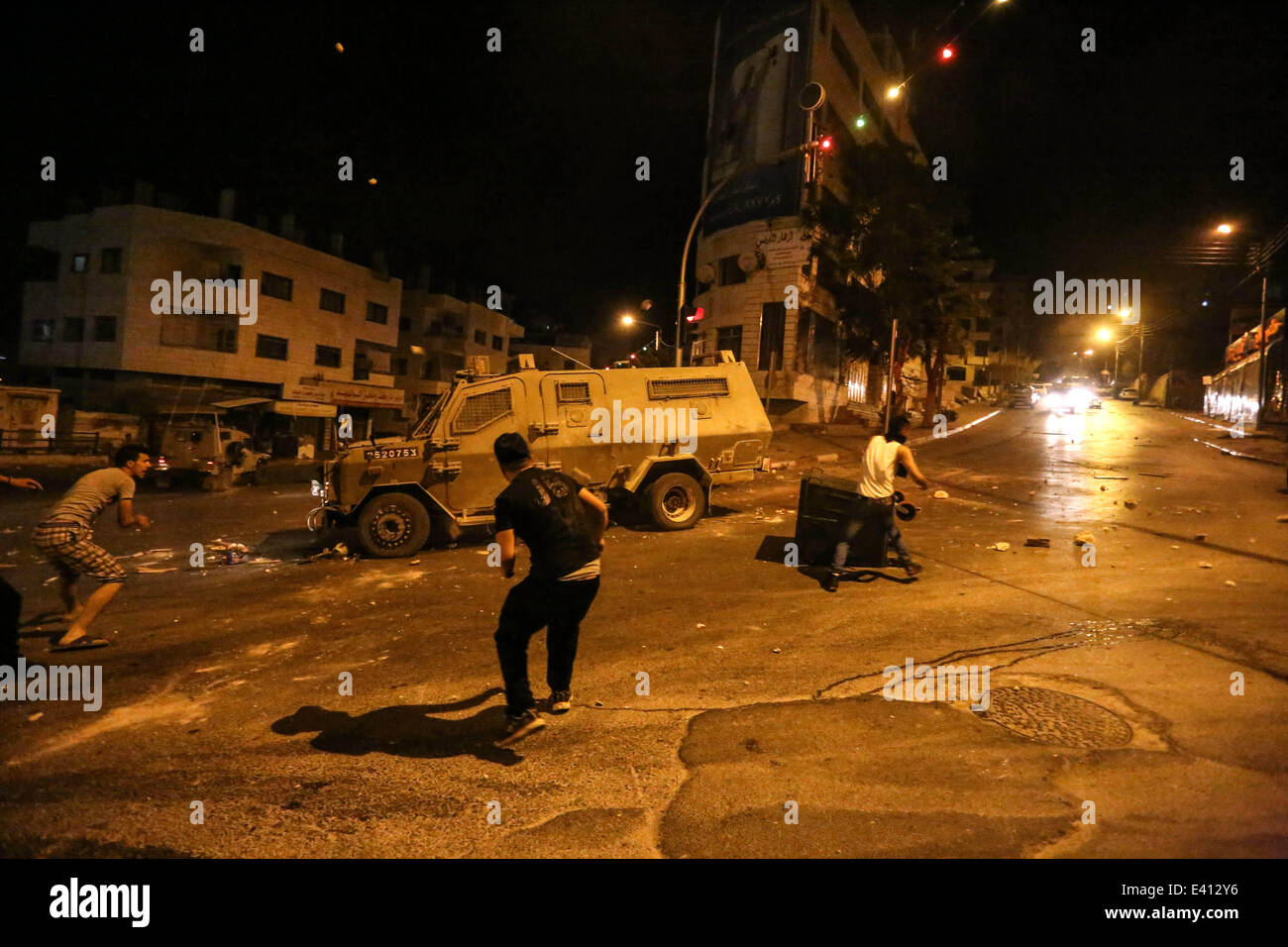 Nablus City, West Bank. 2nd July, 2014. Palestinian protesters threw ...