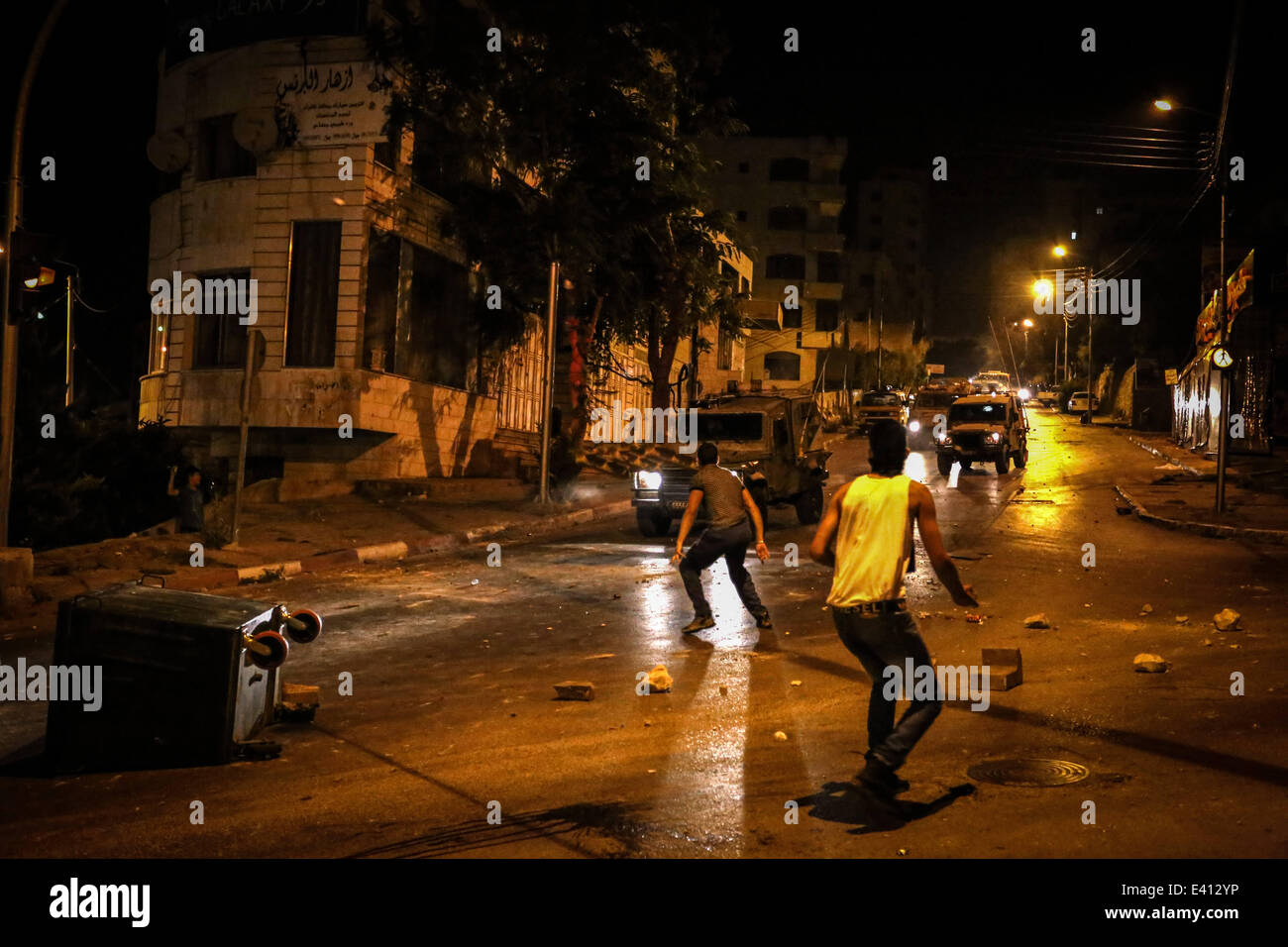 Nablus City, West Bank. 2nd July, 2014. Palestinian protesters threw ...
