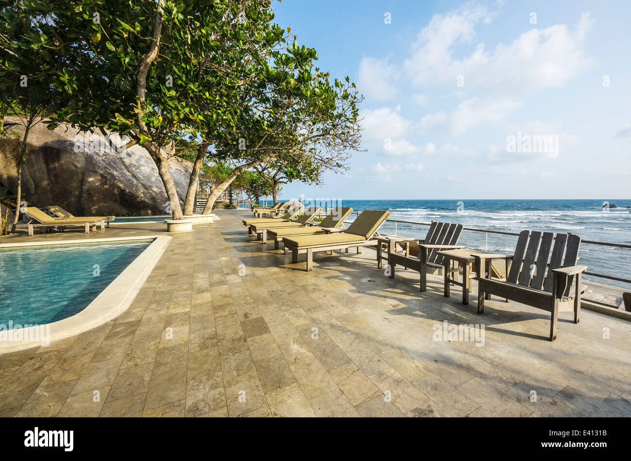 Indonesia, Riau Islands, Bintan, Nikoi Island, Sun loungers at hotel ...
