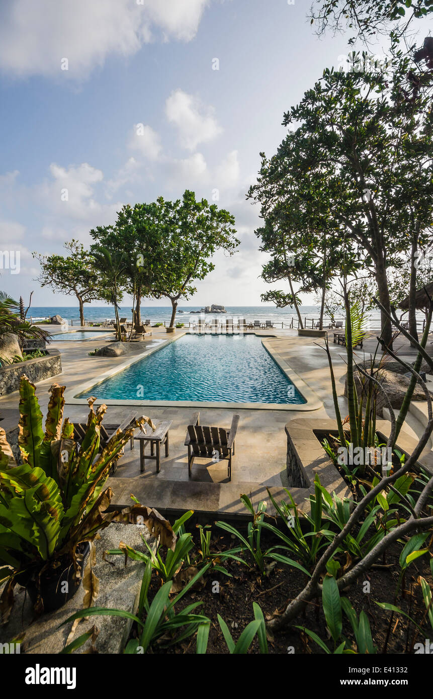 Indonesia, Riau Islands, Bintan, Nikoi Island, Sun loungers at hotel ...
