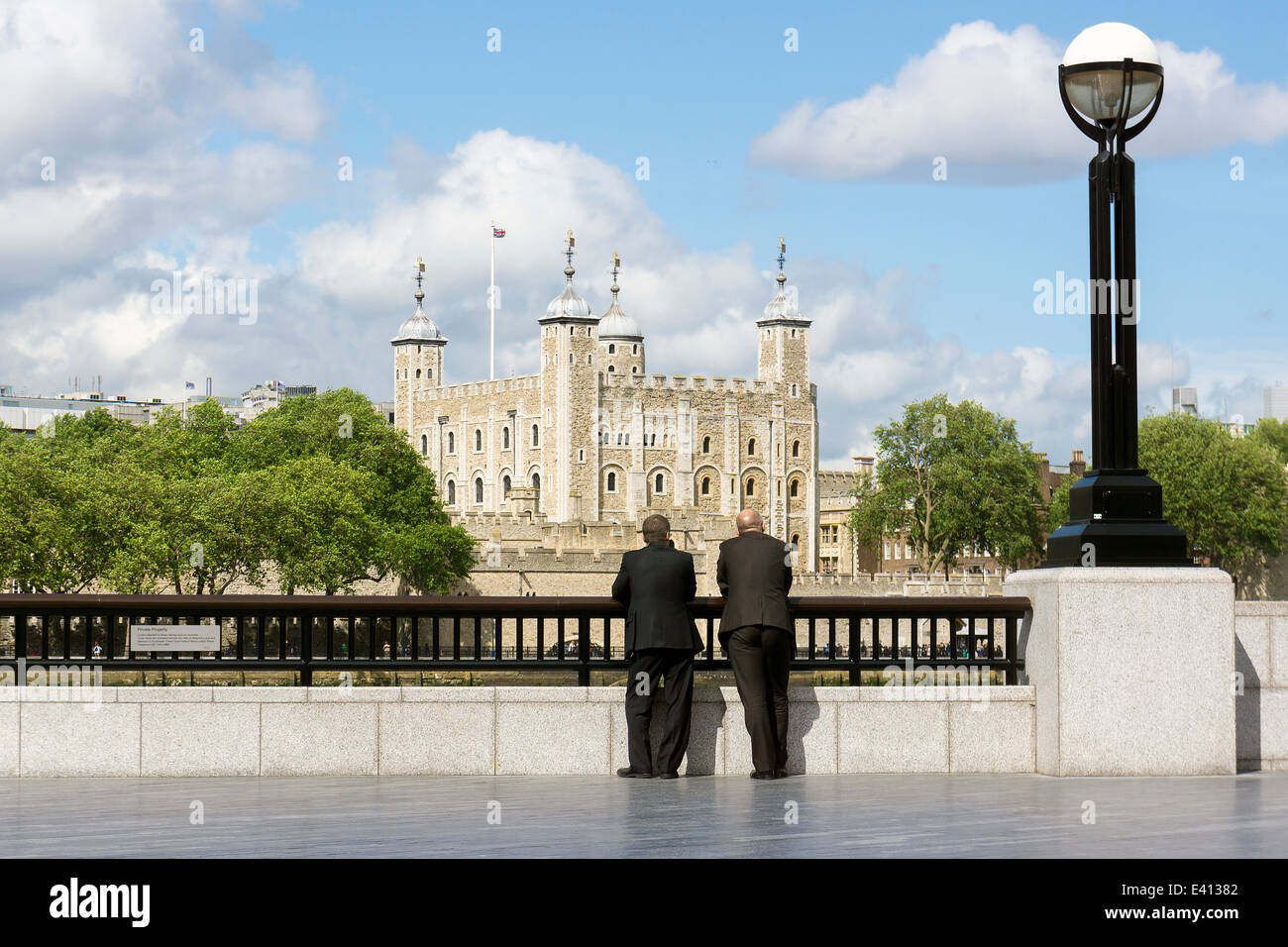 Great Britain, England, London, Two men looking to Tower of London ...