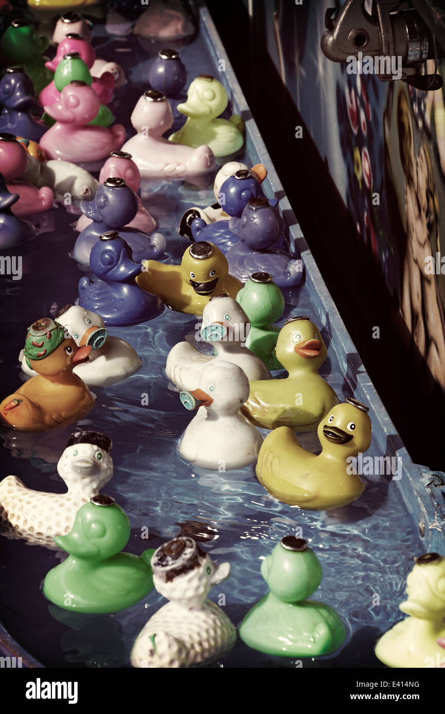 Germany, rubber ducks swimming on flowing water at fair Stock Photo - Alamy
