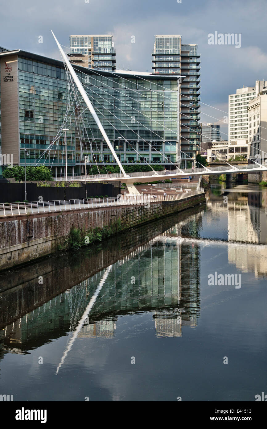 Manchester, UK. The Lowry Hotel and Trinity Bridge over the River ...