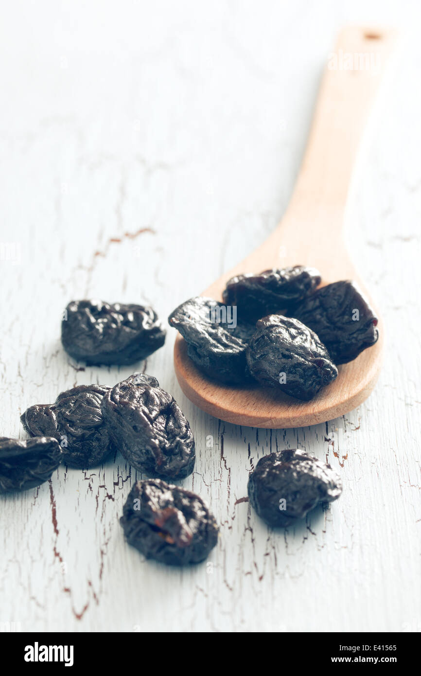 Spoon tasty dried prunes hi-res stock photography and images - Alamy