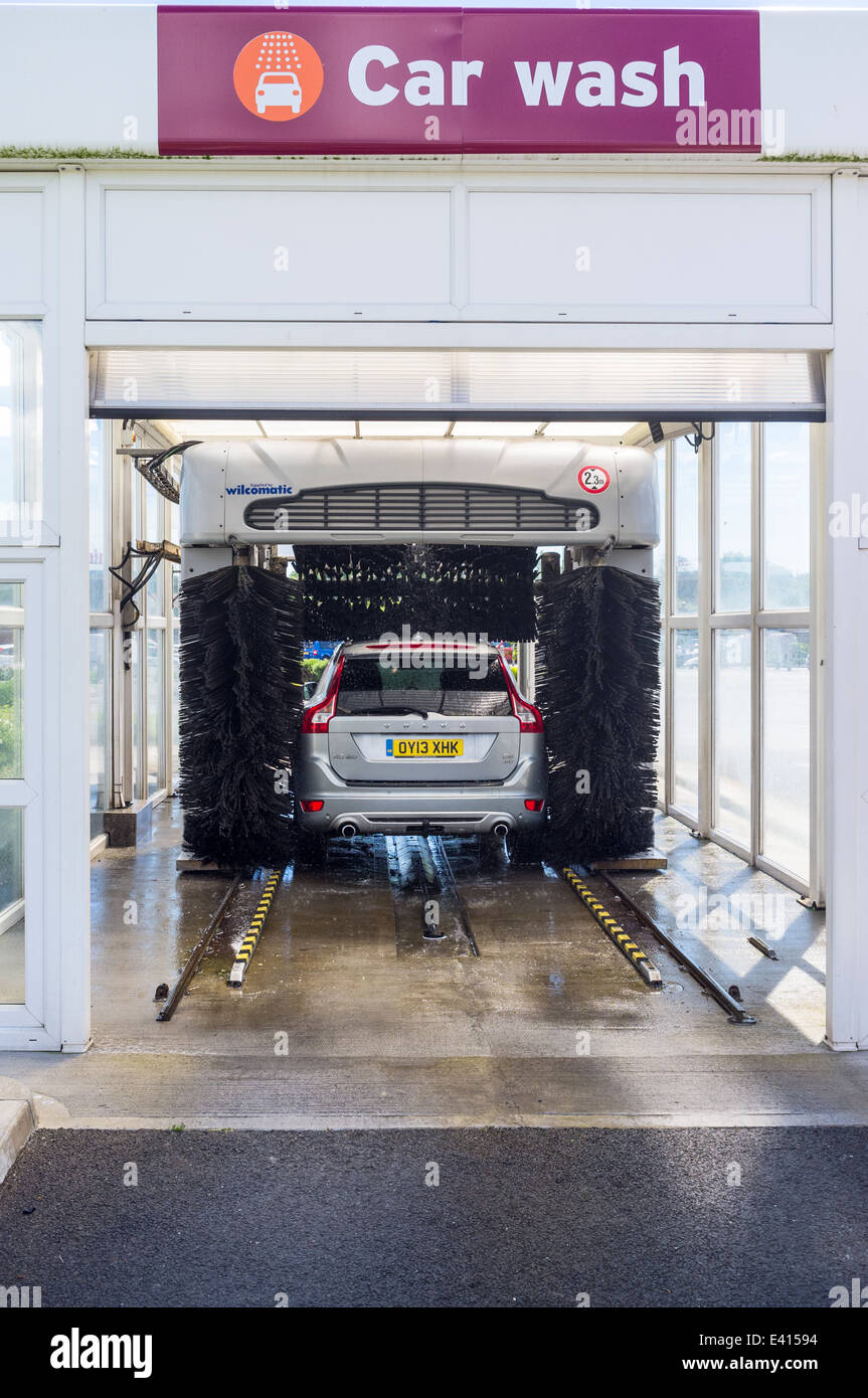 Dawlish, Devon, England. A car goes through a car wash. View from the ...