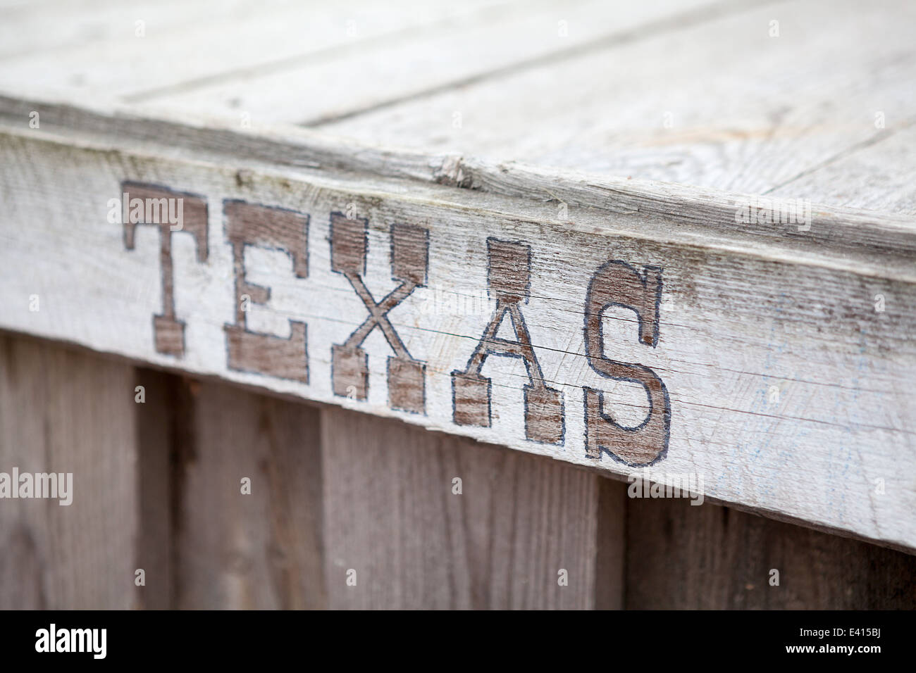 Texas lettering on wooden plate Stock Photo - Alamy