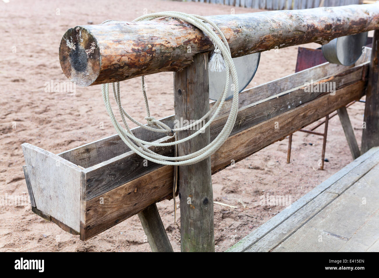 Lasso hanging on timber in western town, nobody Stock Photo - Alamy
