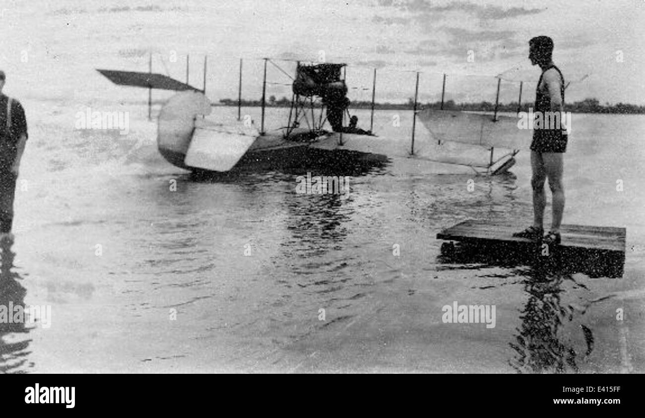 This photograph from the Reasoner Collection features a Curtiss biplane ...