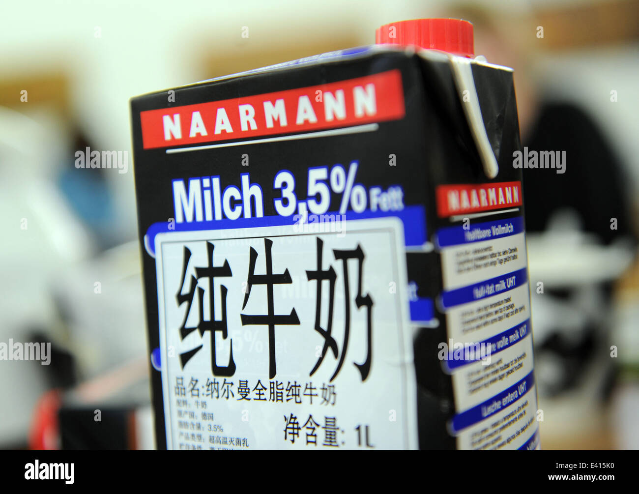 A milk carton marked with stickers for the Chinese market is seen in ...