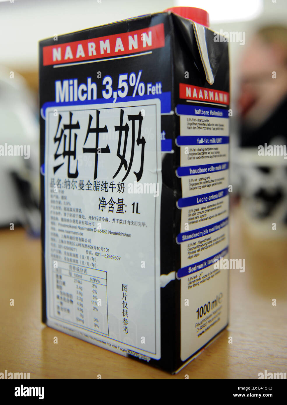 A milk carton marked with stickers for the Chinese market is seen in ...