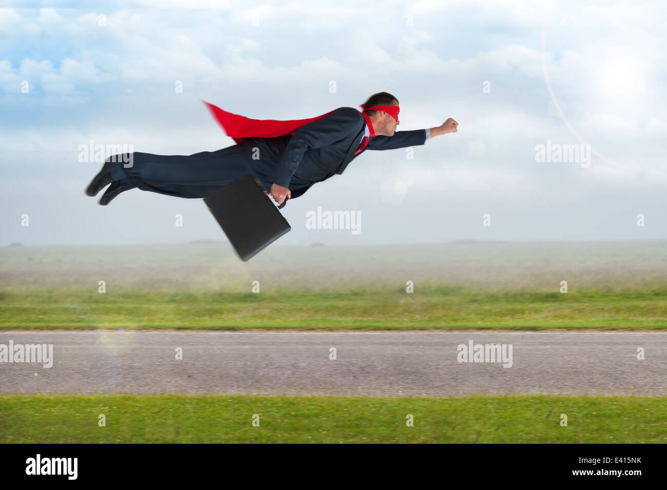 superhero businessman with cape and mask flying Stock Photo - Alamy