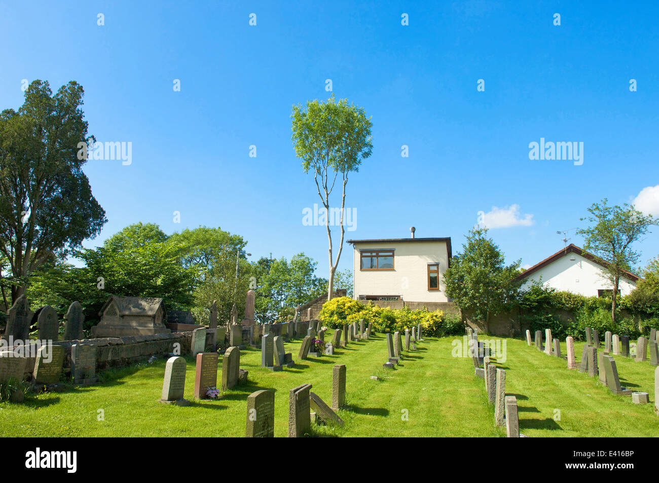 Modern detached house overlooking cemetery Stock Photo - Alamy