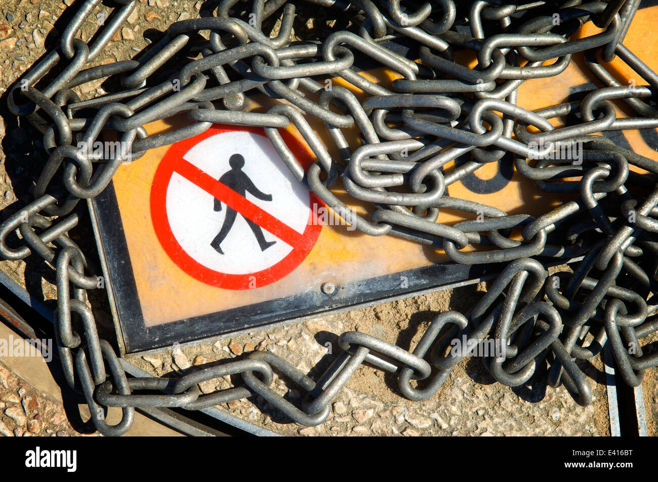 Metal chain covering a no access sign Stock Photo - Alamy