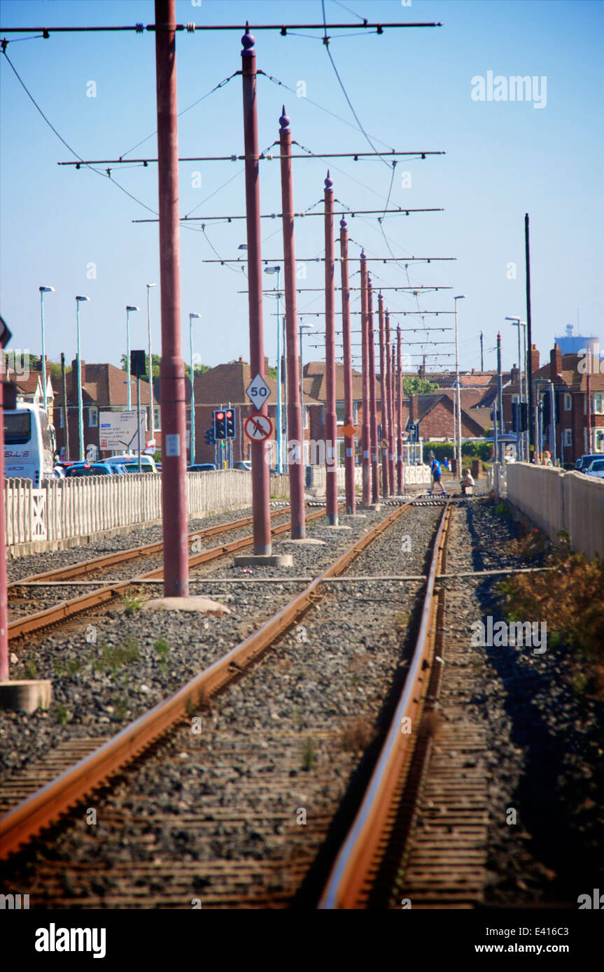 Open tram track in urban area Stock Photo - Alamy