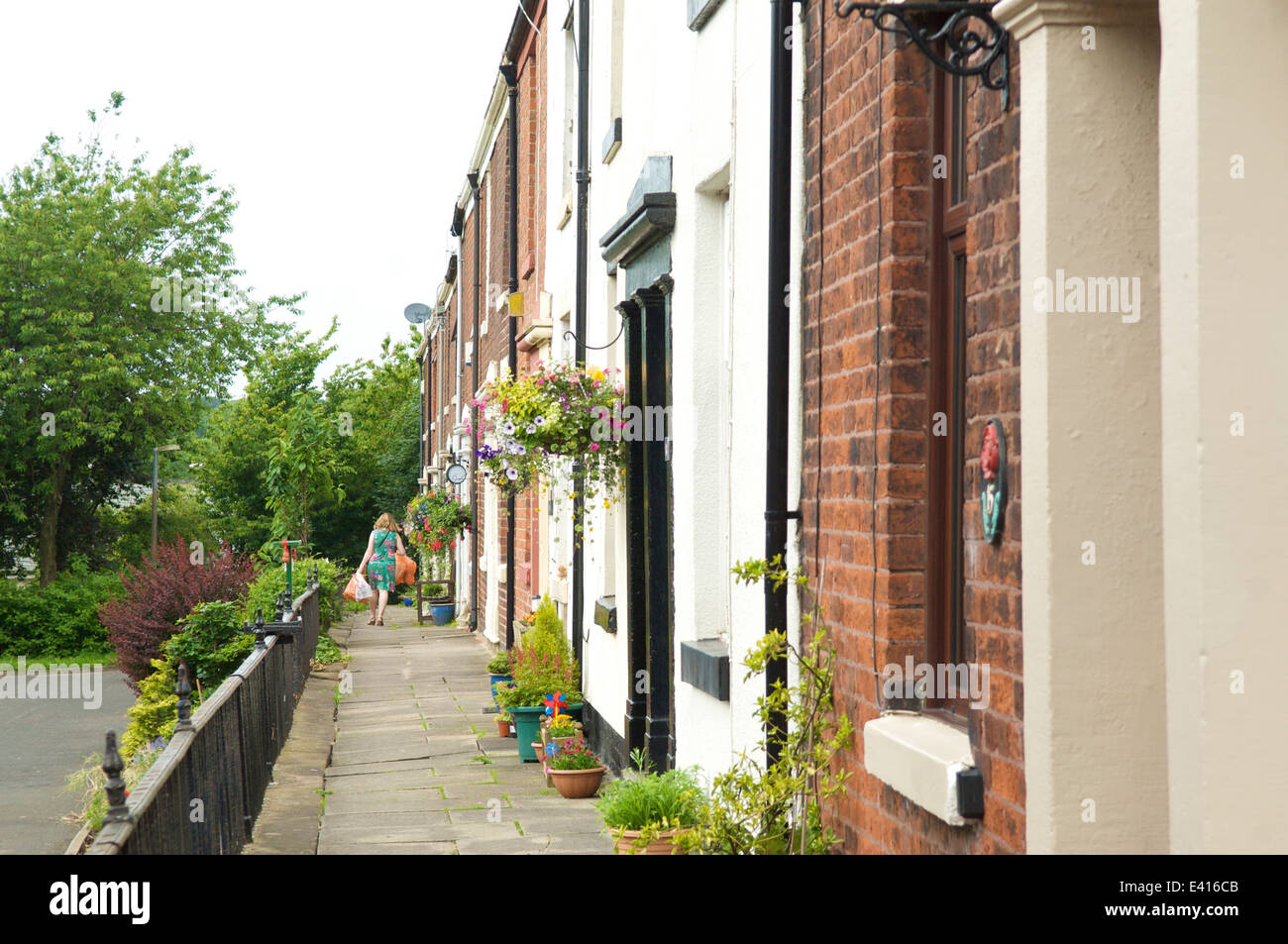 Colourful terrace cottages in summer Stock Photo - Alamy