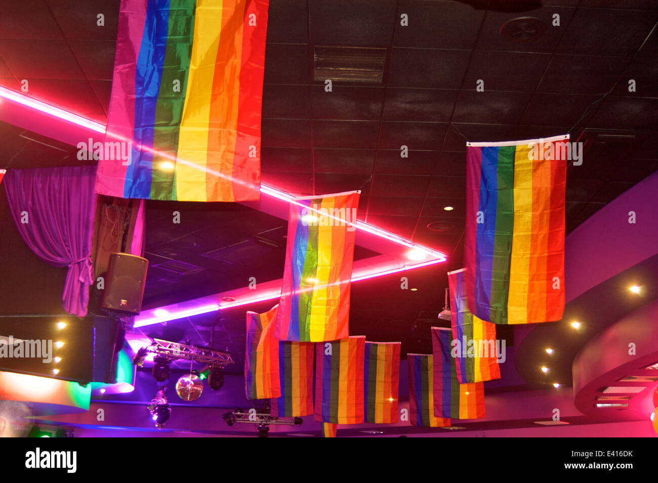 Gay community rainbow flags on display at nightclub Stock Photo - Alamy