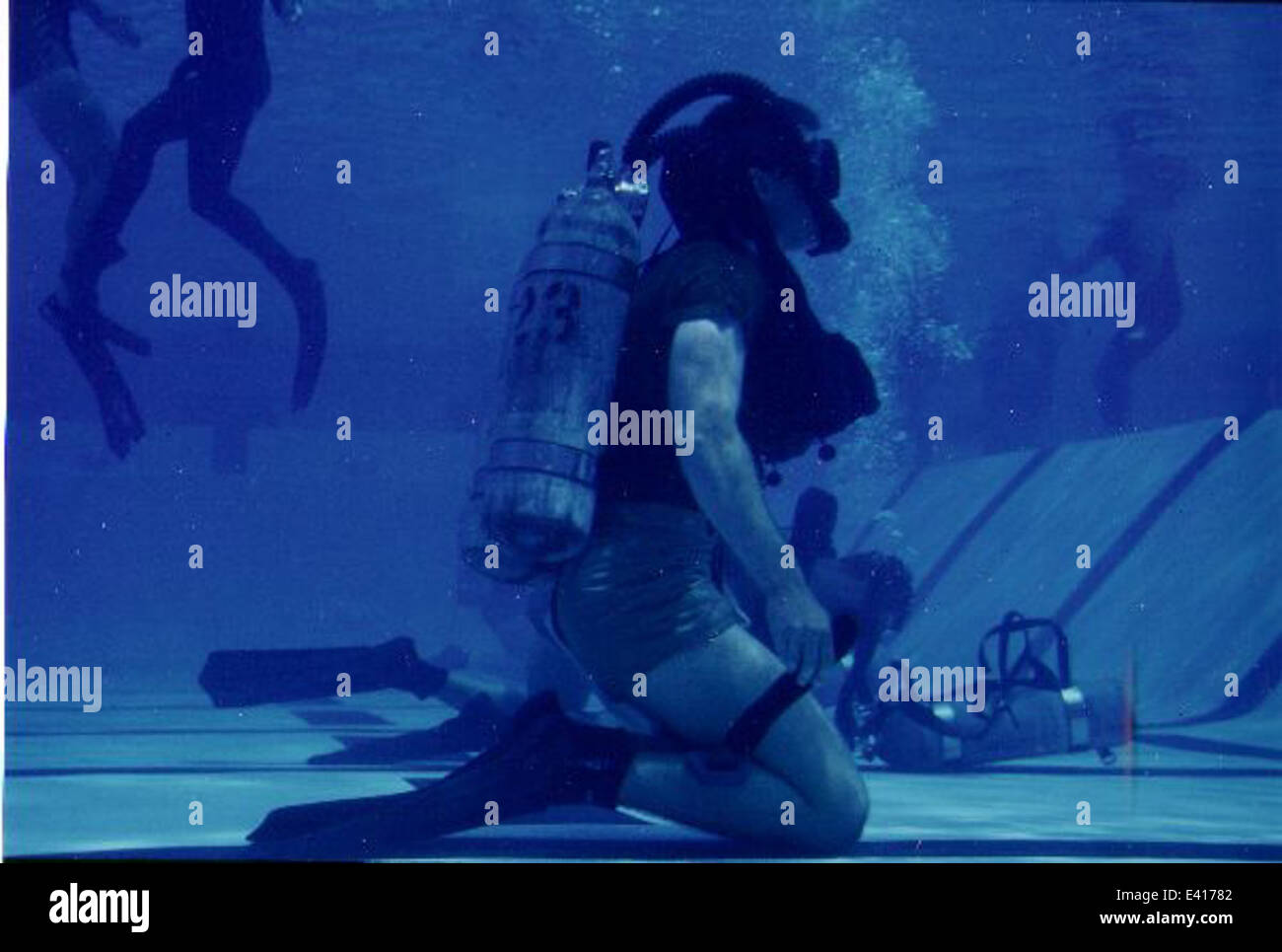 Photograph of a scuba diving training session in a pool, documenting ...