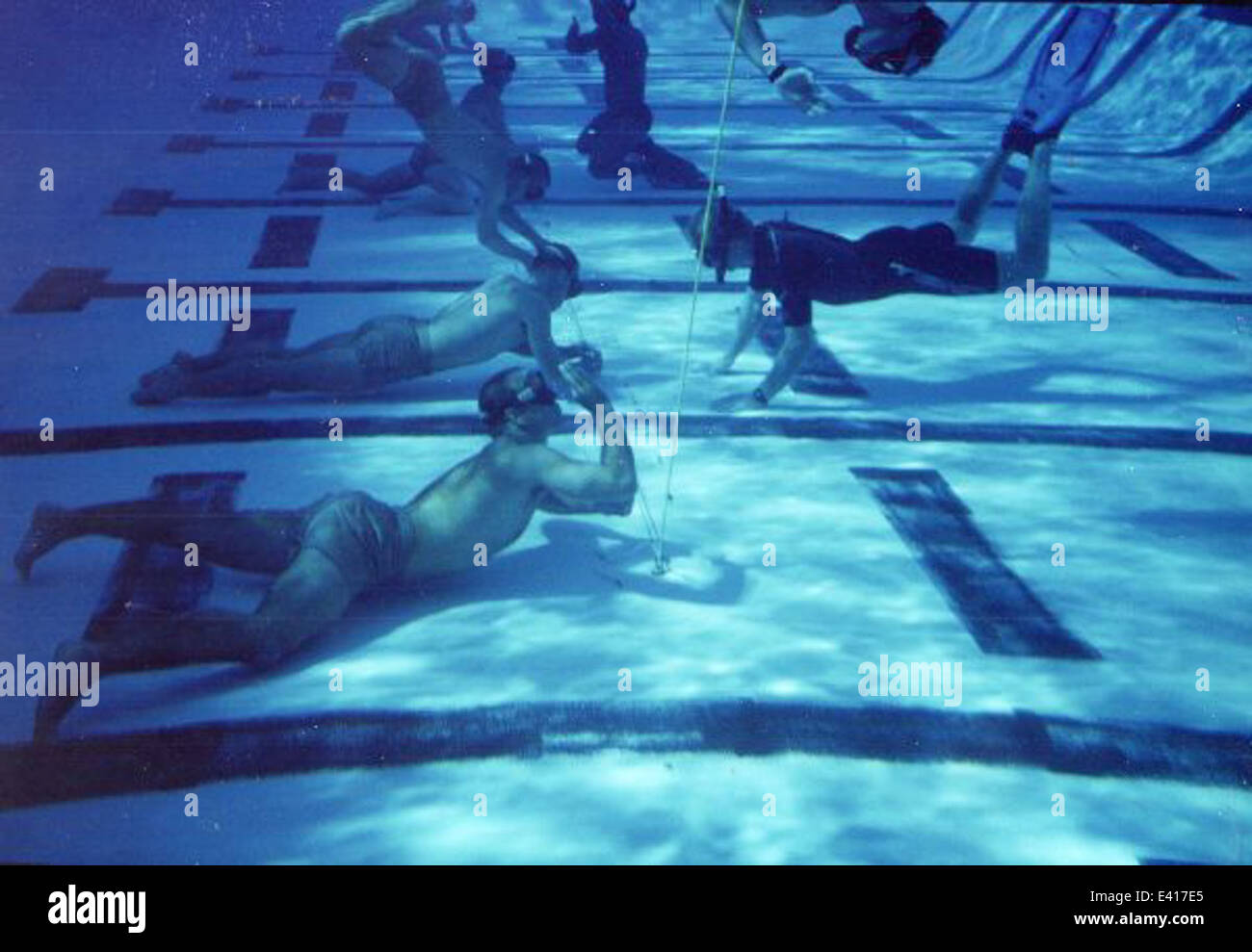 A training exercise in a pool, demonstrating water survival skills and ...