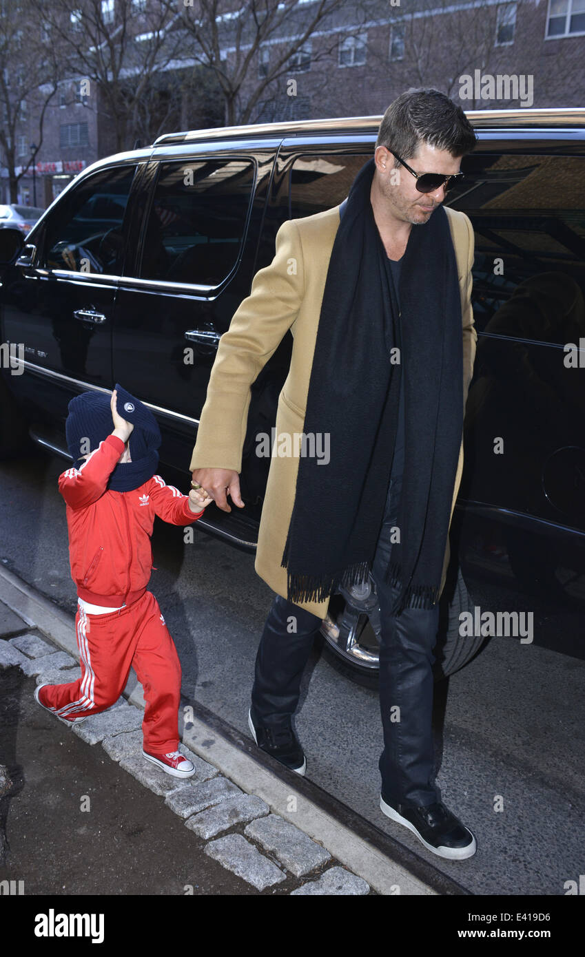 Robin Thicke and his son Julian leaving their hotel in Manhattan ...