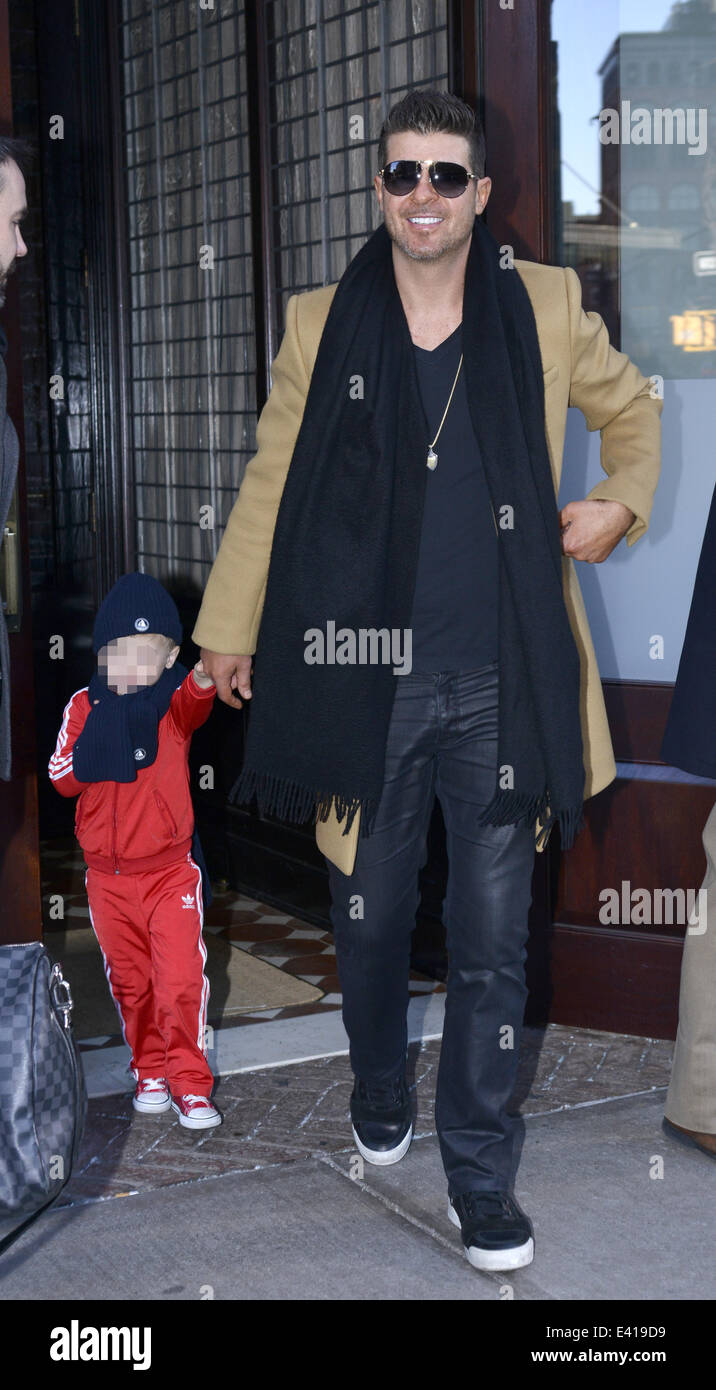 Robin Thicke and his son Julian leaving their hotel in Manhattan ...