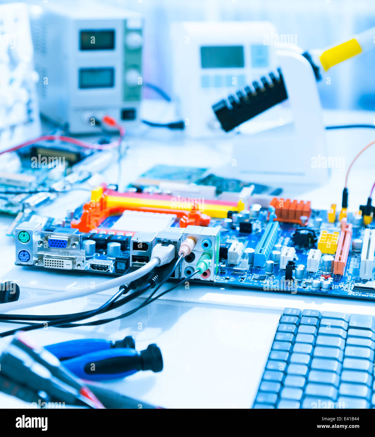 Computer desks repair workshop Stock Photo - Alamy