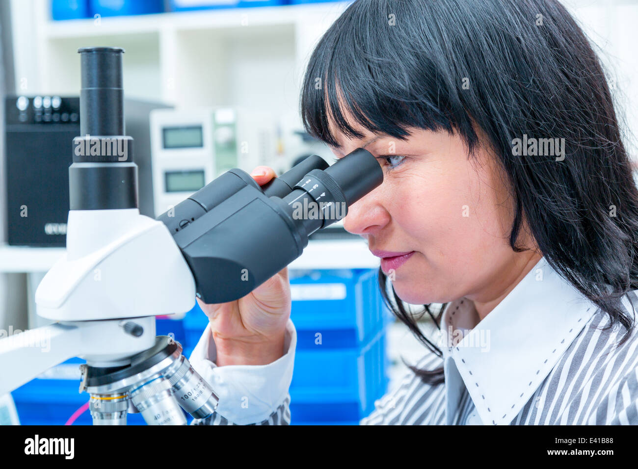 laboratory assistant at the microscope Stock Photo - Alamy