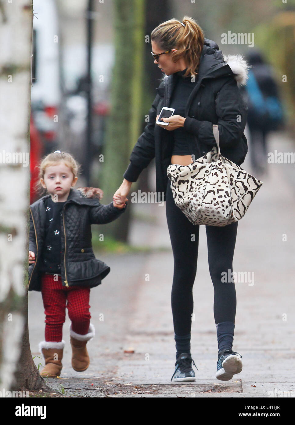 Abbey Clancy leaves home with her daughter Sophia to go to rehearsals ...