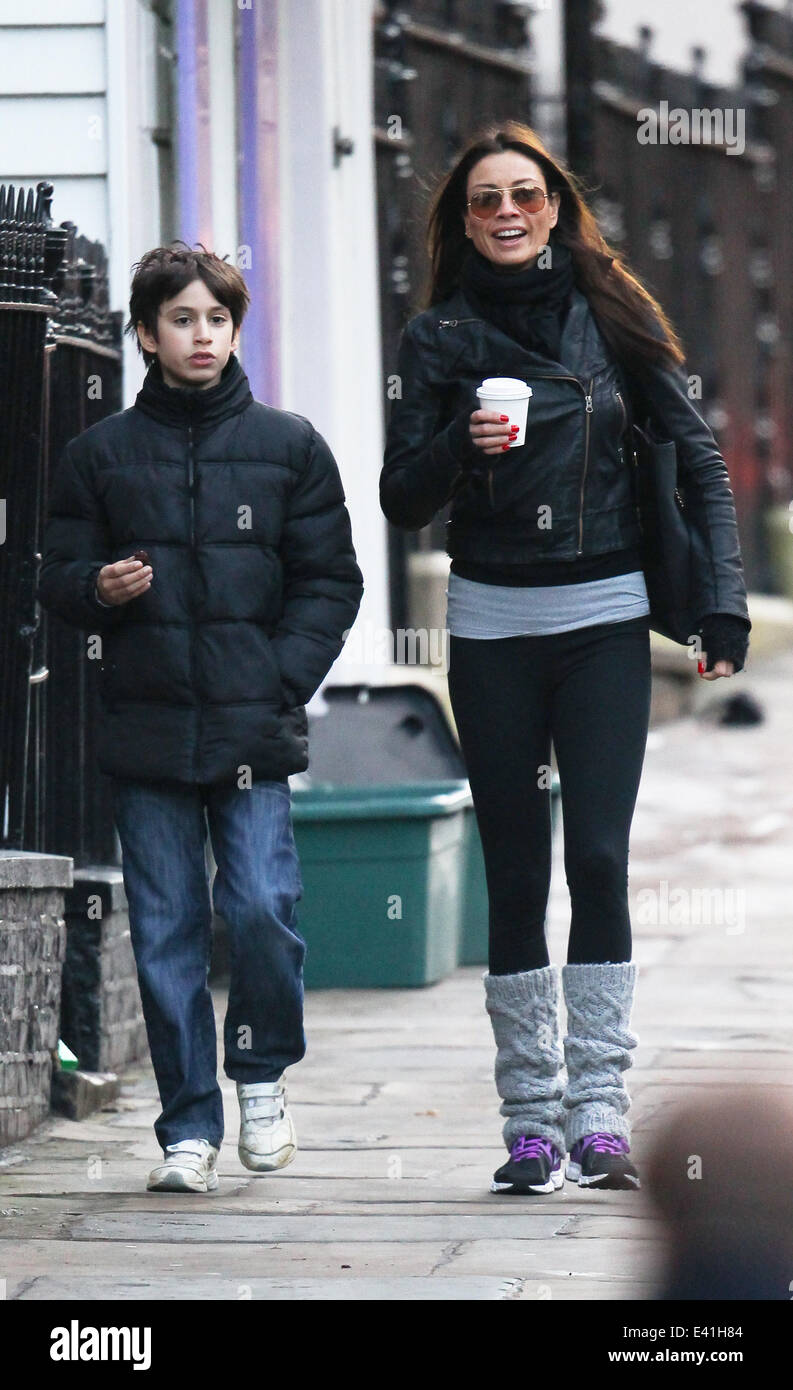 Melanie Sykes wraps up warm for the winter weather while walking near ...