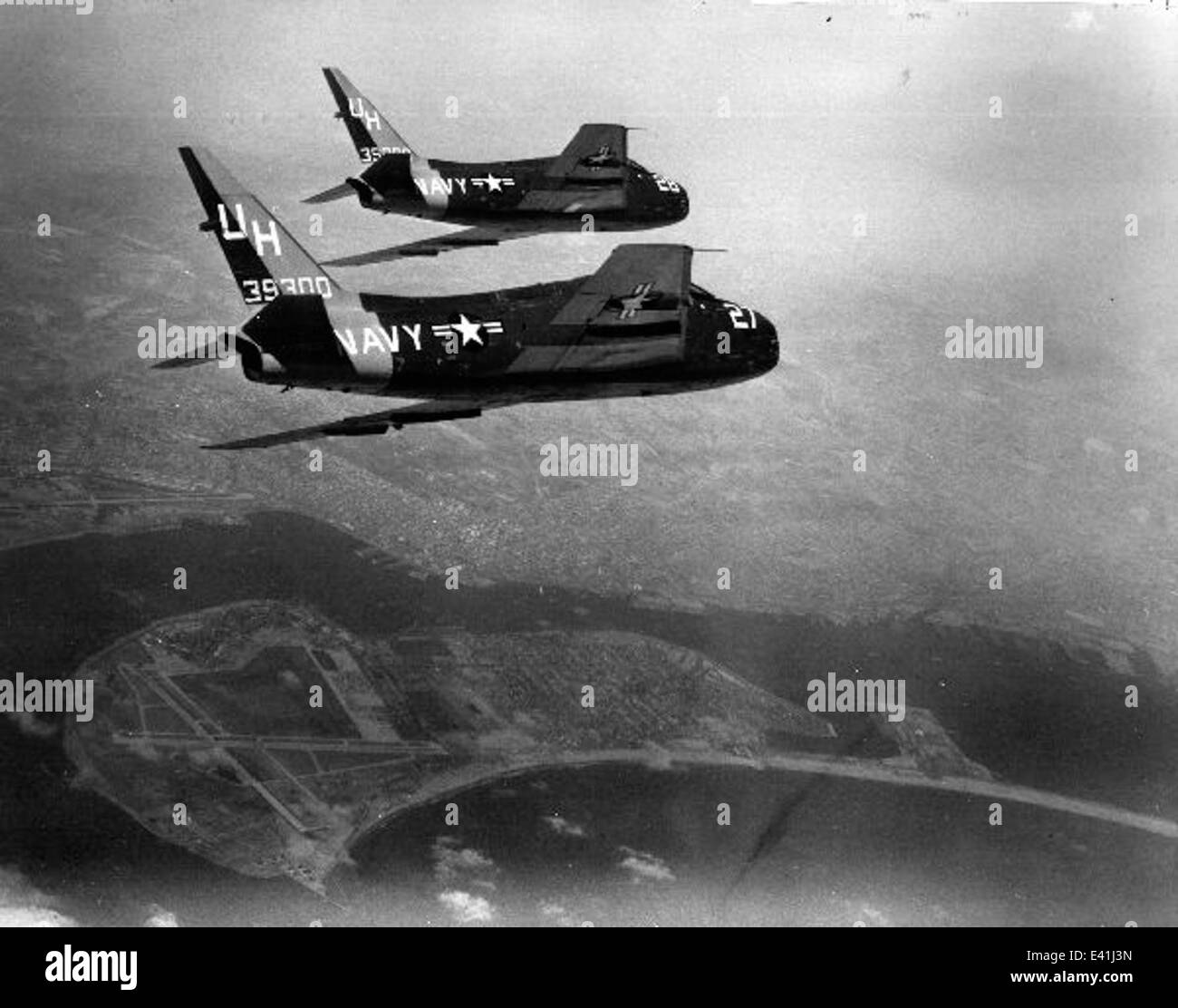 A photograph depicting a flight of FJ-4B Fury aircraft from the VC-7 ...