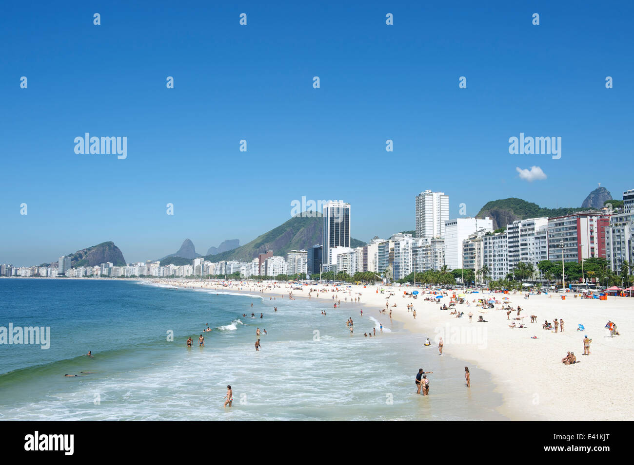 Scenic view of Copacabana Beach shore with skyline of Rio de Janeiro ...