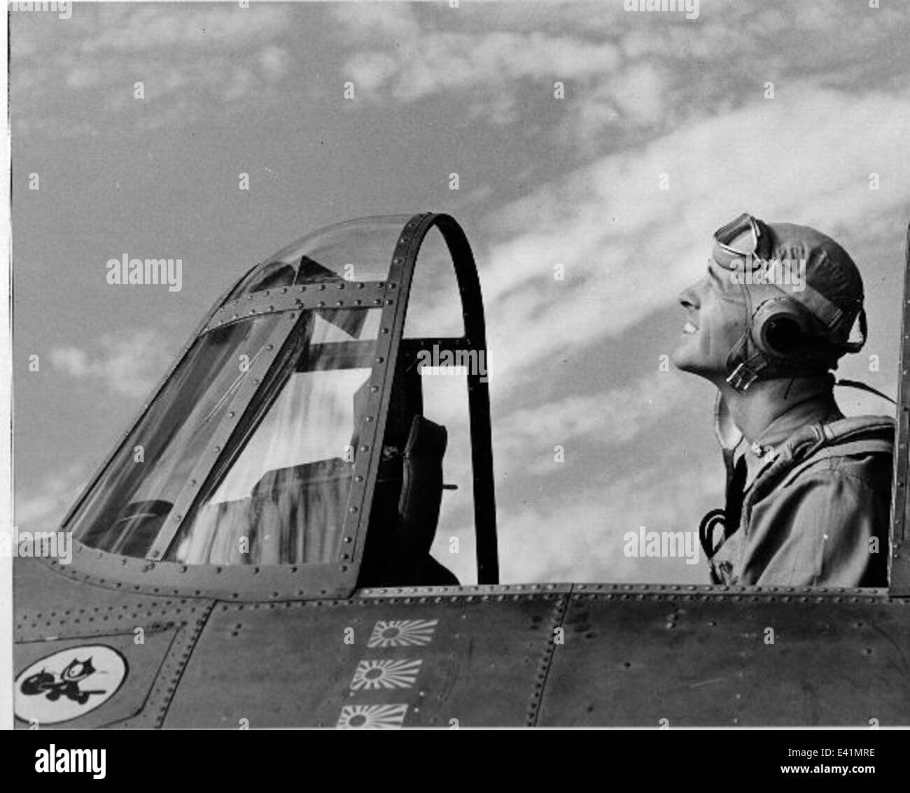 A 1942 photograph of Jimmy Thach, a U.S. Navy fighter ace, with his F4F ...