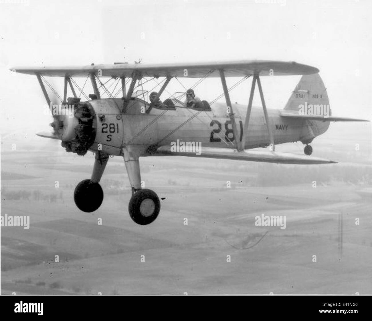 This image features a Stearman N2S3, a biplane used by the U.S. Navy ...