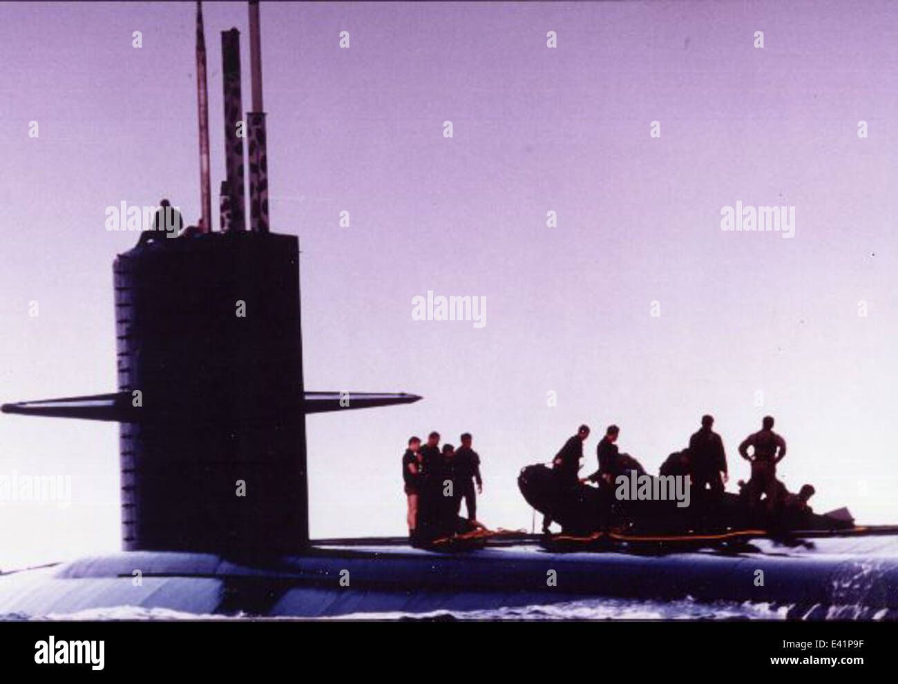This photograph shows U.S. Navy SEALs aboard a nuclear-powered ...