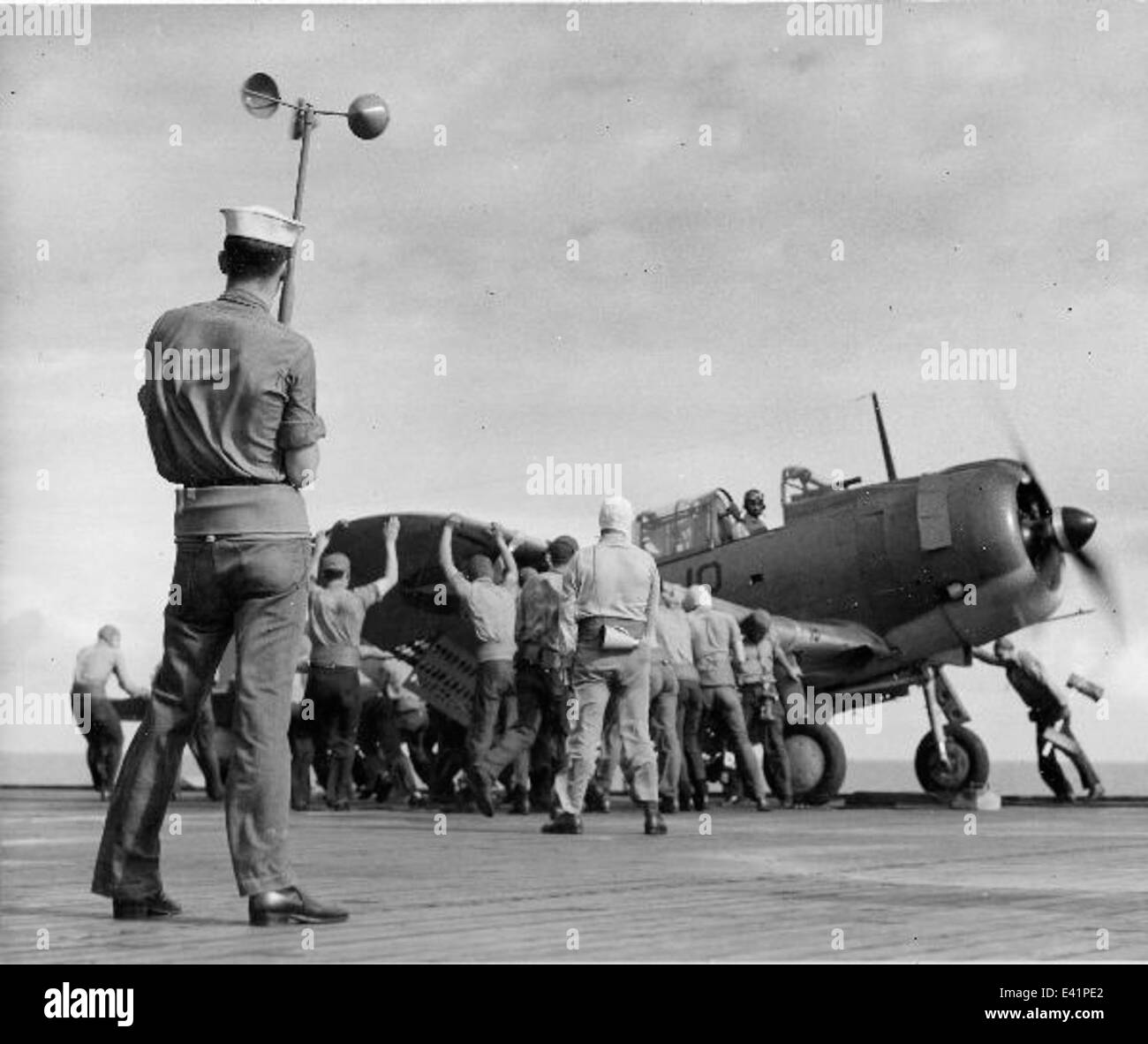 The SBD-3 Dauntless dive bomber is launched from an aircraft carrier ...